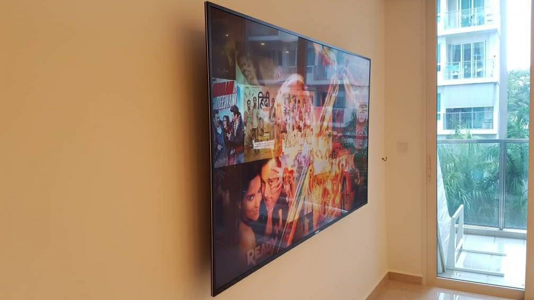 Sony 75" LED TV (35kg) mounted on partition board using large tilt ...